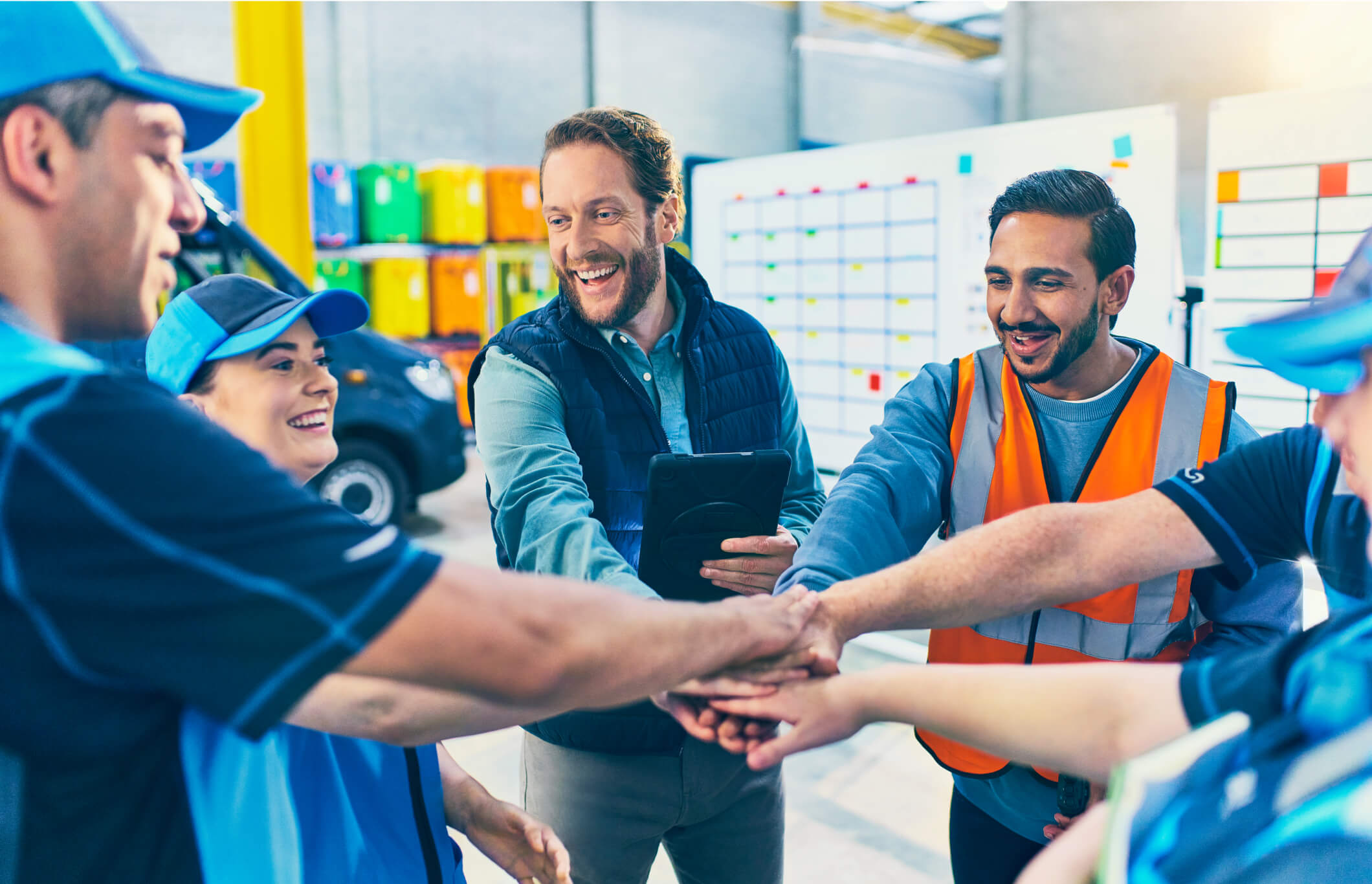 Delivery service partner having a team meeting with delivery associates