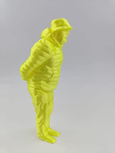 Statua Umarell Giallo. Statua dell'uomo che guarda il cantiere con ...