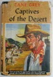 Amazon.co.jp: Captives of the Desert : Japanese Books