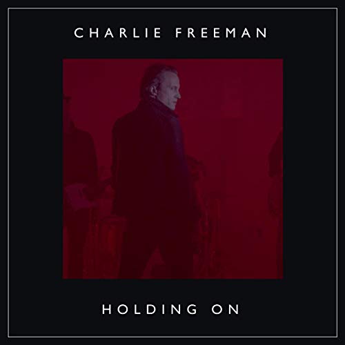 Holding On by Charlie Freeman on Amazon Music - Amazon.co.uk