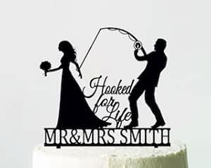 Amazon.com: Hooked for Life Wedding Cake Topper,Groom Pulling Bride ...