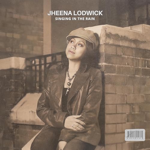 Play Singing In The Rain by Jheena Lodwick on Amazon Music