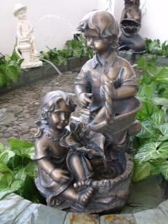 Amazon.com : Solar Boy and Girl Water Feature : Patio, Lawn & Garden
