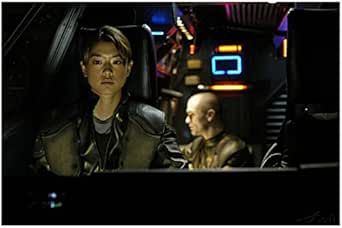 Sharon / Athena / Boomer piloting Raptor with Crashdown in background ...