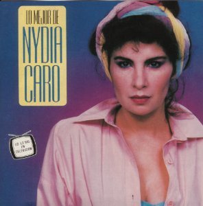 Amazon.com: Lo Mejor De Nydia Caro: 0078635307122: Books