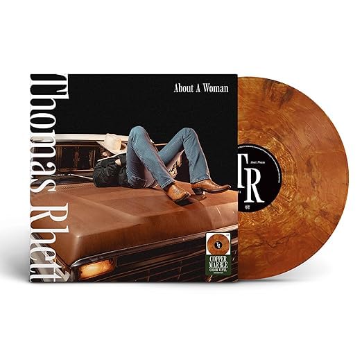 Amazon.com: About A Woman [Translucent Copper Nugget Vinyl]: CDs & Vinyl