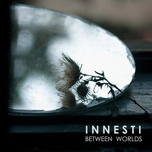 Écouter Between Worlds de Innesti sur Amazon Music