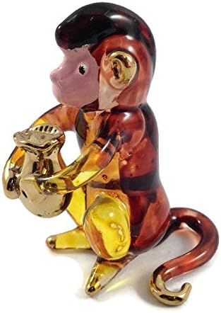 Amazon.com: 2" Tall Crystal Monkey Holding a Gold Bag Miniature ...