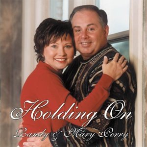 Holding On: Randy Perry: Amazon.in: Music}