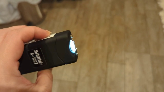 Watch Review of SABRE 2-in-1 Stun Gun and Flashlight with holder on ...