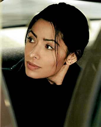 Sarah Shahi as Sameen Shaw looking out of car in Person of Interest 8 x ...