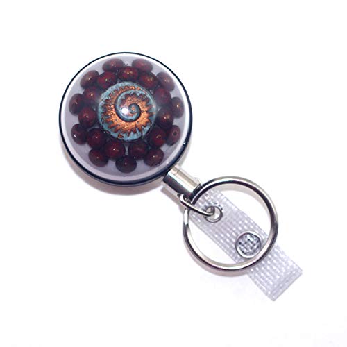 Amazon.com: Shell Badge Reel : Handmade Products