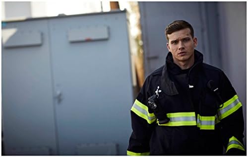 9-1-1 Oliver Stark as Evan 'Buck' Buckley Standing Tall Waist Up Shot 8 ...