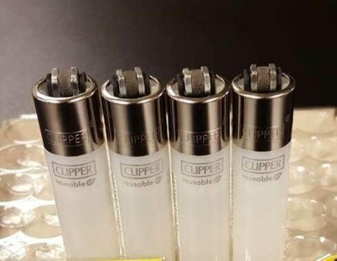 Set Of 4 New Clipper Lighters Regular Size Clear colour : Amazon.co.uk ...