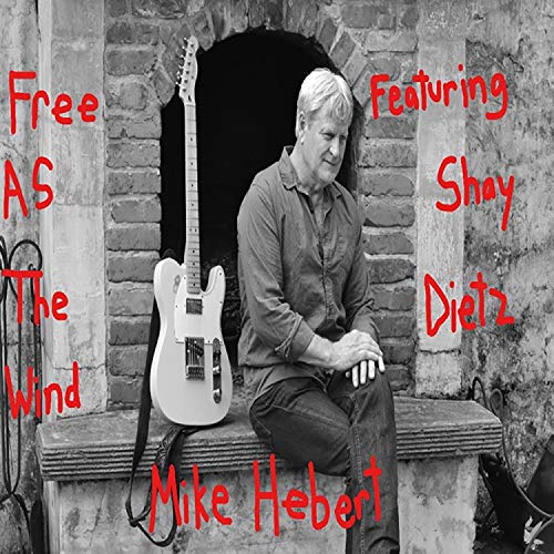 Free As The Wind by Mike Hebert on Amazon Music - Amazon.co.uk