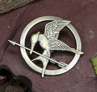 Merchandise 24/7 The Hunger Games Broche geai moqueur Argent : Amazon ...