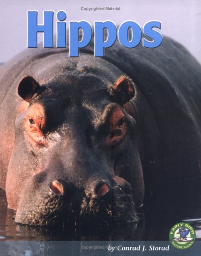 Hippos (Early Bird Nature Books): Storad, Conrad J.: 9780822528692 ...