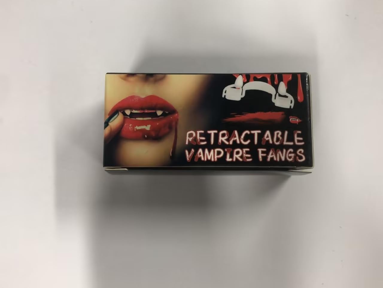 Amazon.com: Retractable Vampire Fangs Party Ball Fang Prank Teeth ...