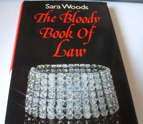 The Bloody Book of Law: Woods, Sara: 9780312084899: Amazon.com: Books