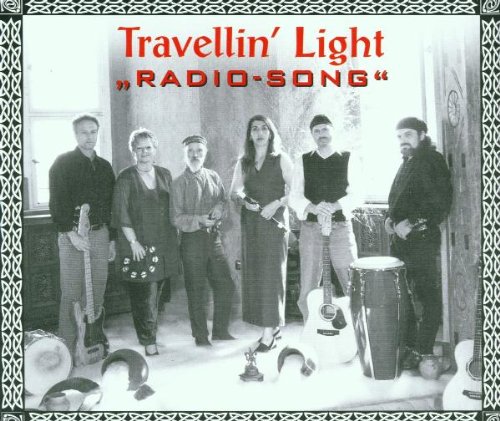 Radio Song : Travellin' Light: Amazon.es: CDs y vinilos}