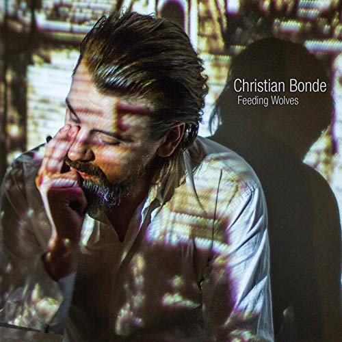 Amazon Music - Christian BondeのFeeding Wolves - Amazon.co.jp