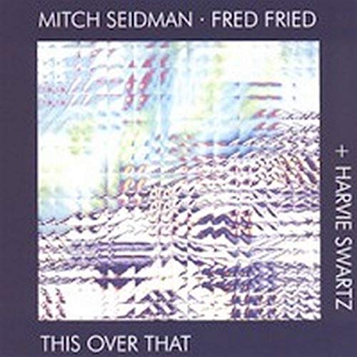 Amazon.com: This Over That: CDs y Vinilo