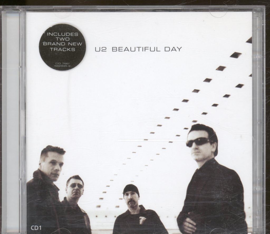 Beautiful Day [CD 1] [CD 1]: Amazon.co.uk: CDs & Vinyl