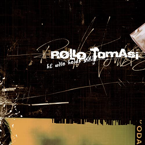 Play He Who Holds You by Rollo Tomasi on Amazon Music
