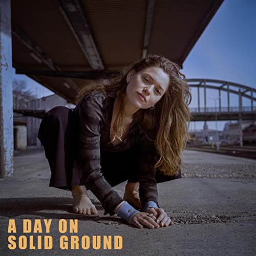 Amazon.com: A Day on Solid Ground : Elsa: Música Digital