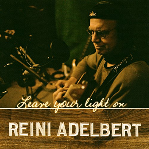 Play Leave Your Light On by Reini Adelbert feat. Jonny Blundell ...