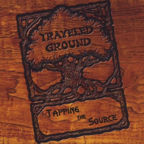 Amazon.co.jp: Tapping the Source : Traveled Ground: 洋書