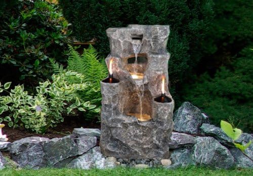 Gartenbrunnen Felsen mit 2 Öllampen Polyresin : Amazon.de: Garten