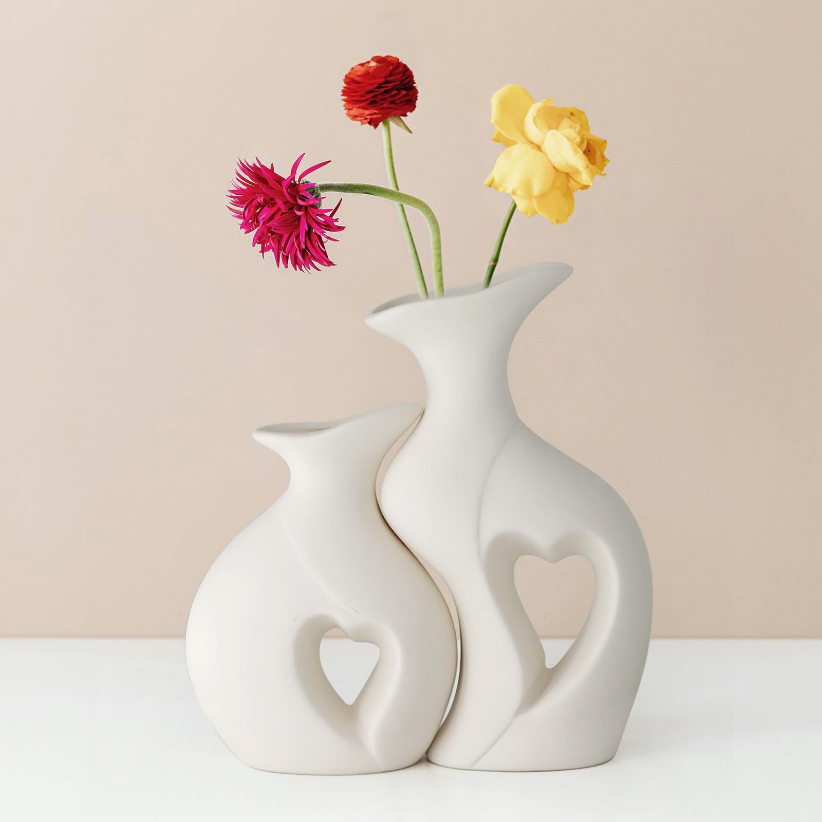 Amazon.com: Levvohd Off White Hollow Ceramic Vase Set of 2, Round ...