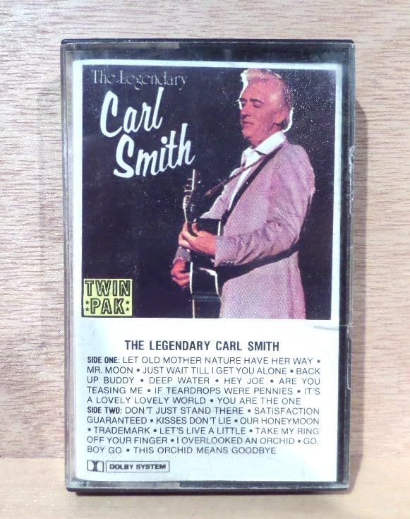 Legendary: Smith, Carl: Amazon.in: Music}