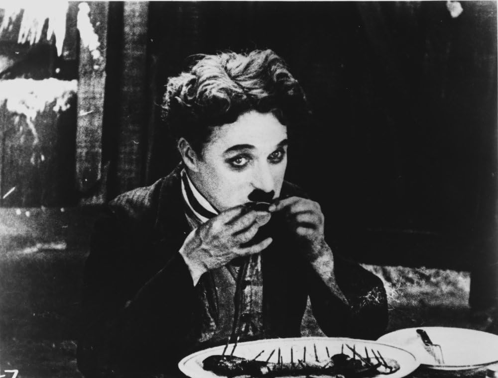 Amazon.com: A film still of Charlie Chaplin eating Photo Print (10 x 8 ...