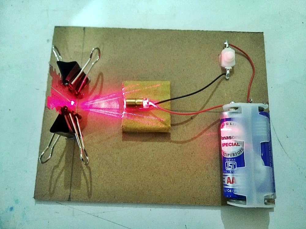 Single slit diffraction of light using razor blades science working ...