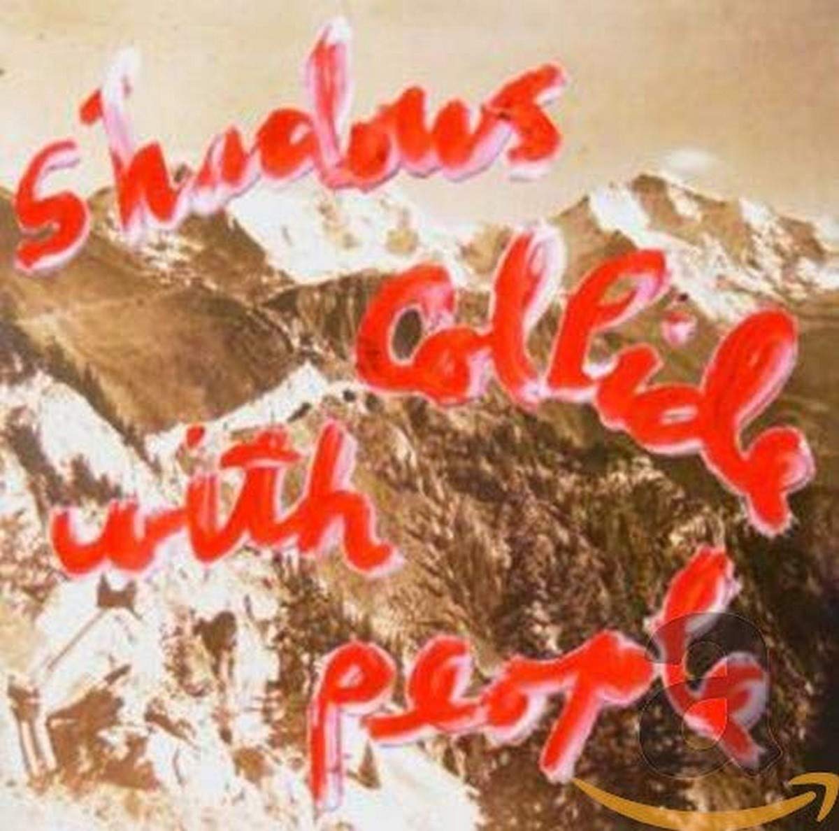 Amazon.com: Shadows Collide With People (U.S. Version): CDs y Vinilo
