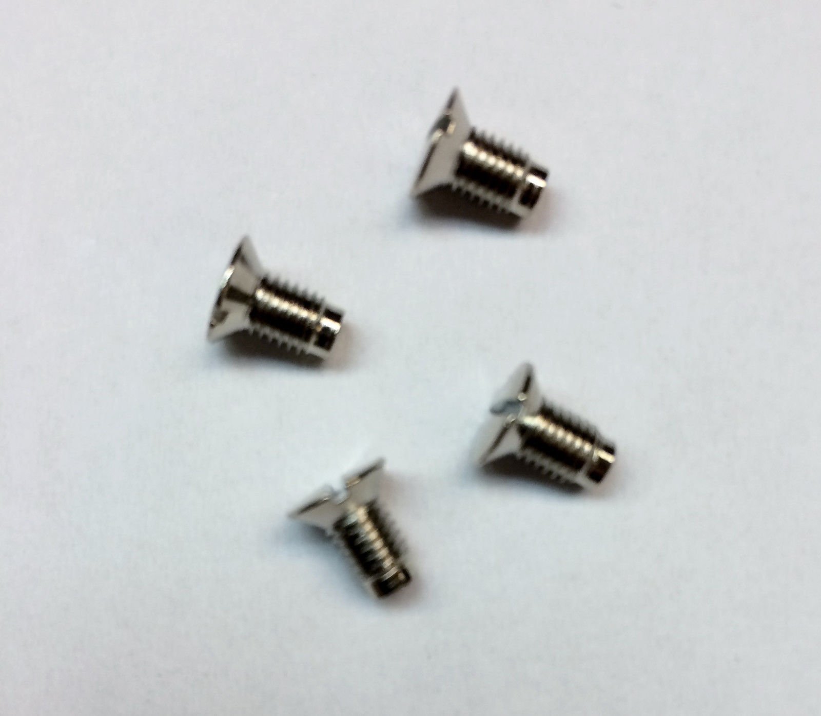 Amazon.com: NEEDLE PLATE SCREWS 4 each 691 SINGER 400W & 600W SINGLE ...