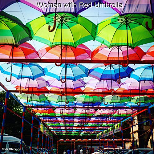 Play Woman with Red Umbrella by Torfi Olafsson on Amazon Music