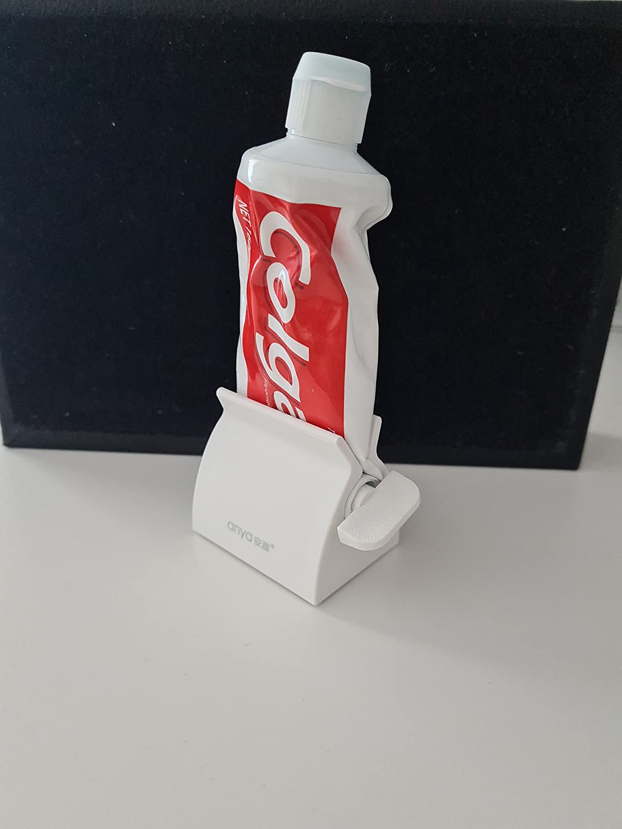 Rolling Tube Toothpaste Squeezer Toothpaste Seat Holder Stand : Amazon ...