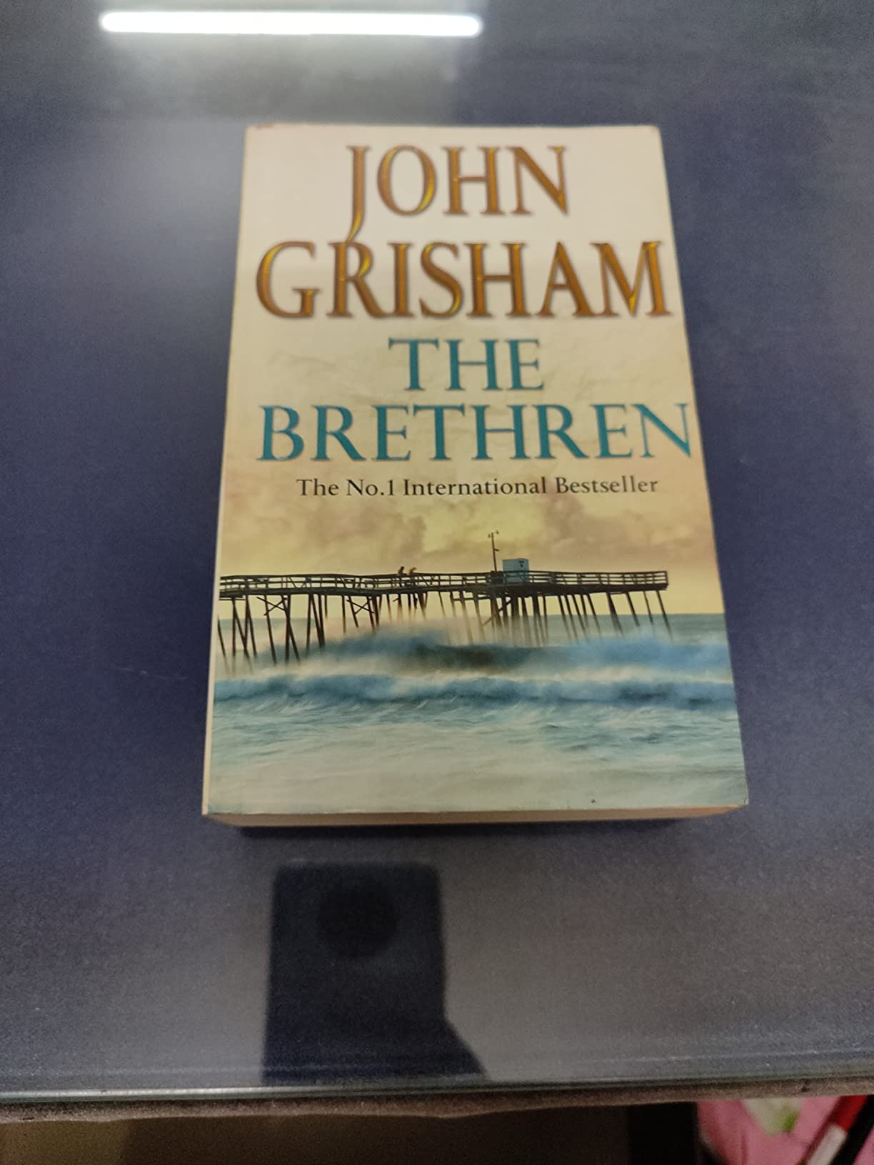 The Brethren : Grisham, John: Amazon.in: Books