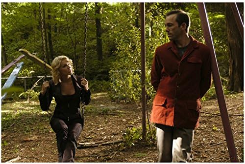 Cylon Number Six in Forest Sitting on Swing Set with Red Jacket Cylon ...