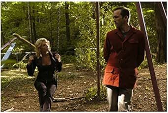 Cylon Number Six in Forest Sitting on Swing Set with Red Jacket Cylon ...