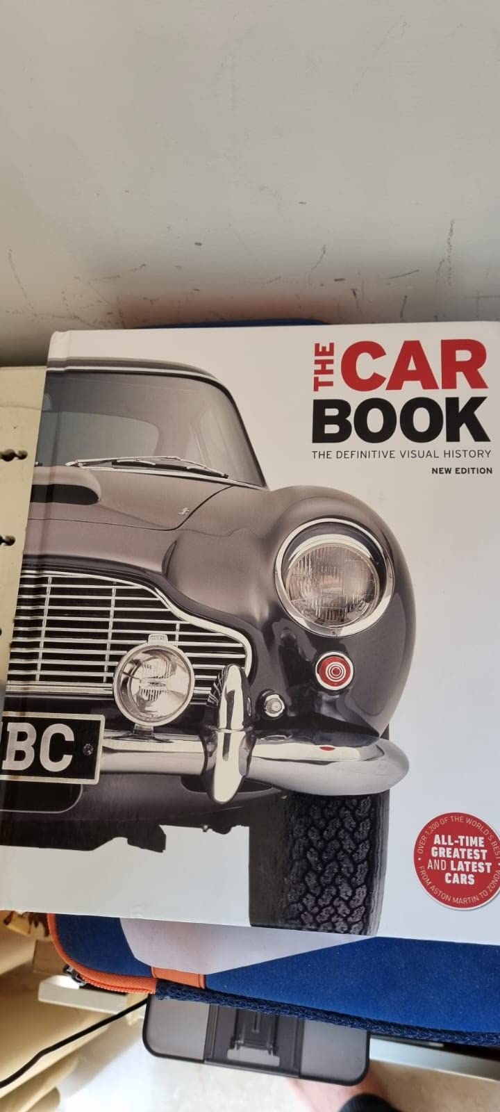 The Car Book: The Definitive Visual History : DK: Amazon.in: Books