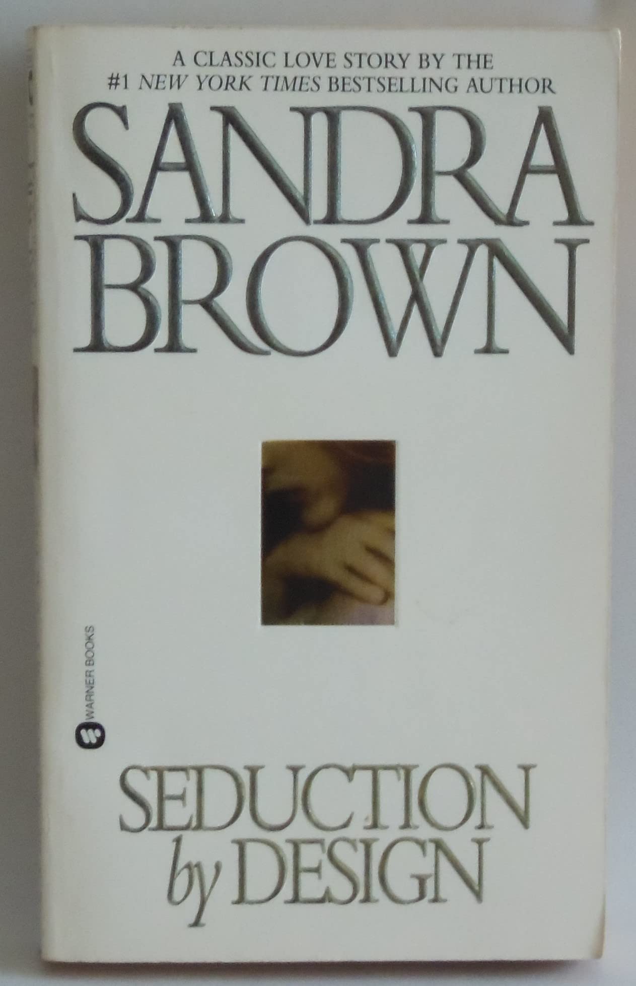 Amazon.com: Seduction by Design: 9780446603102: Brown, Sandra: Books