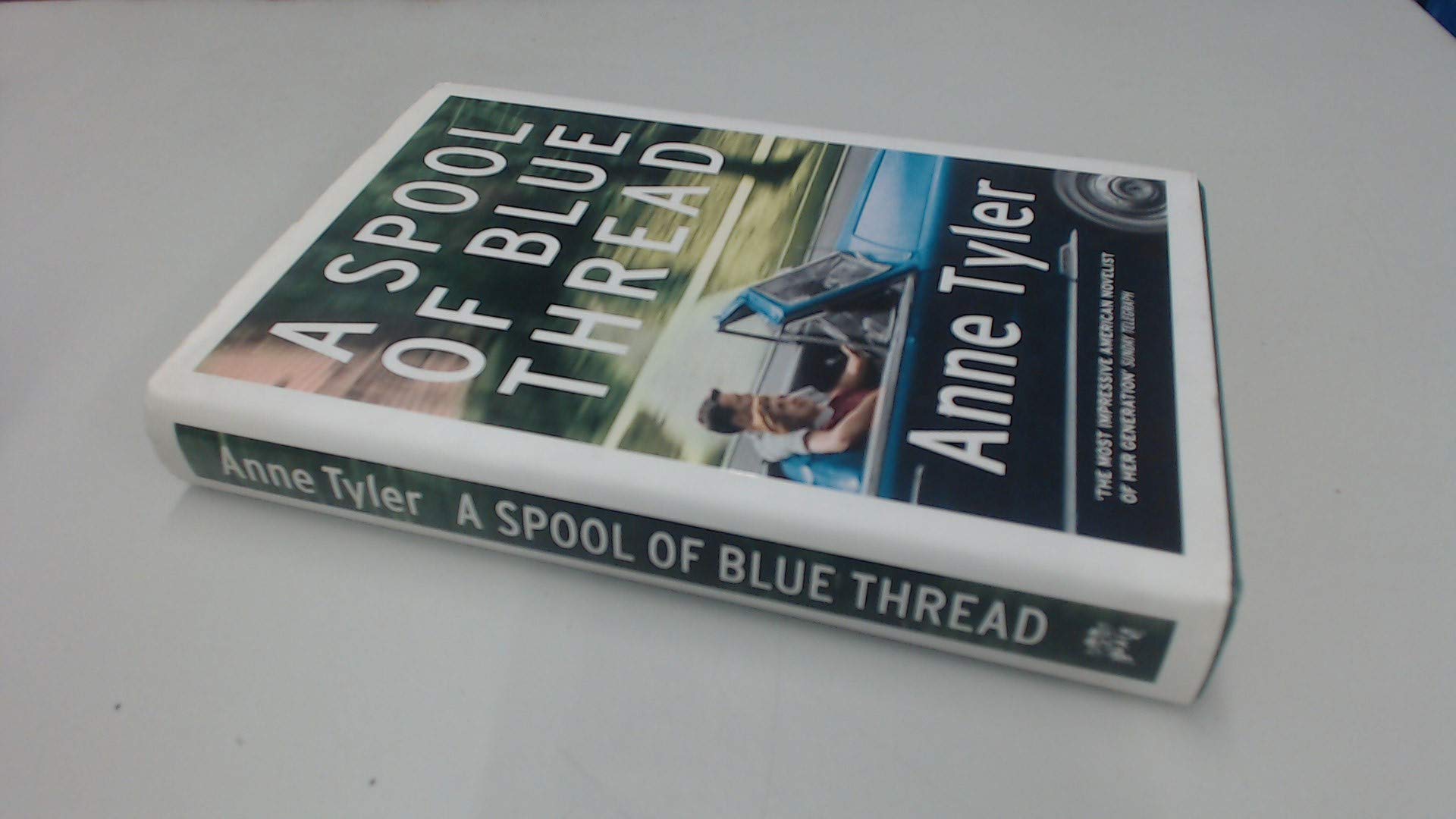 Amazon.com: A Spool of Blue Thread: 9780385683425: Tyler, Anne: Books