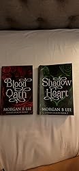Amazon.com: Blood Oath: A Paranormal Reverse Harem Romance (Cursed Legacies): 9798876179845: Lee ...
