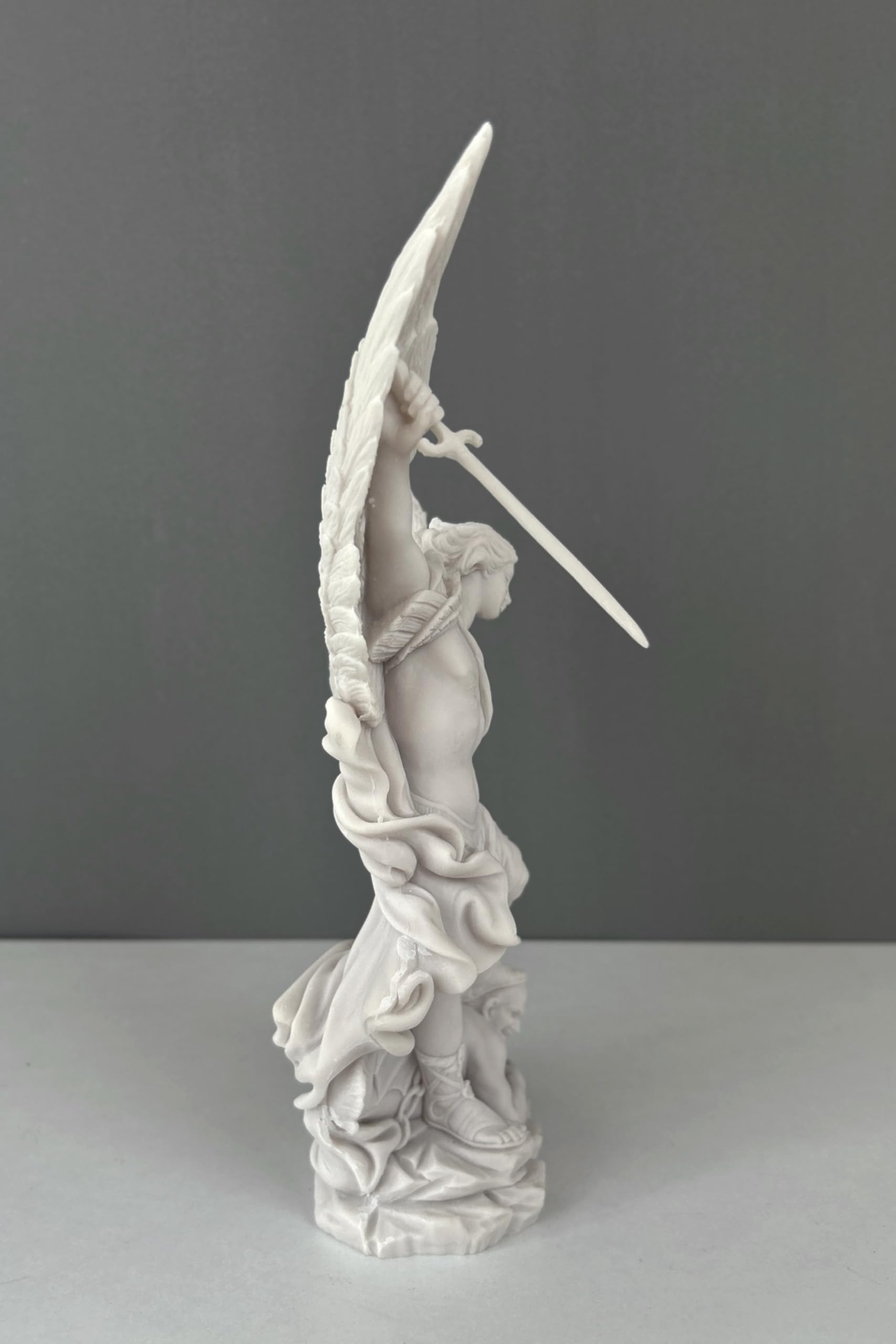 Angel Fighting Demon Statue