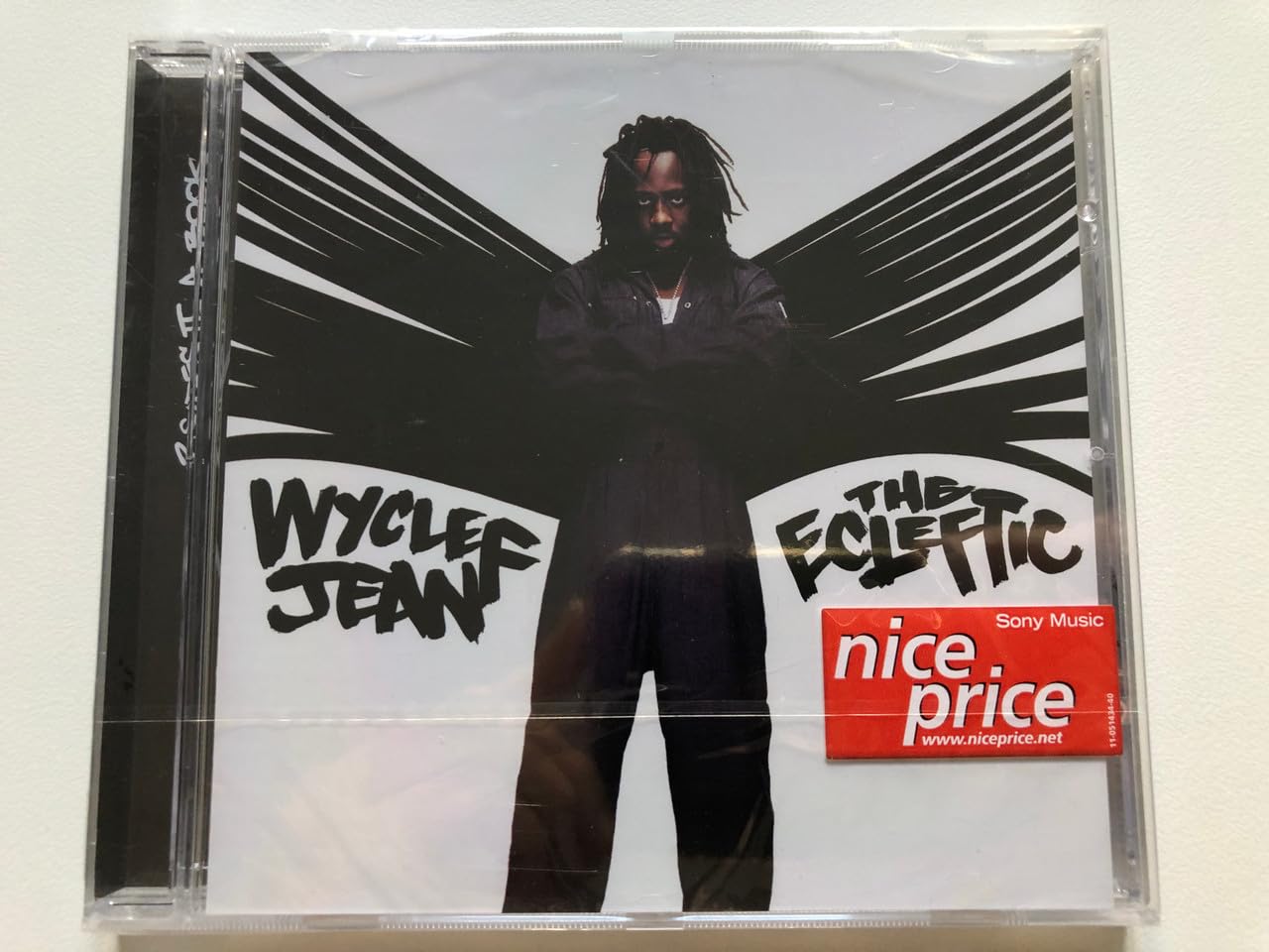 The Ecleftic: Jean, Wyclef: Amazon.fr: CD et Vinyles}