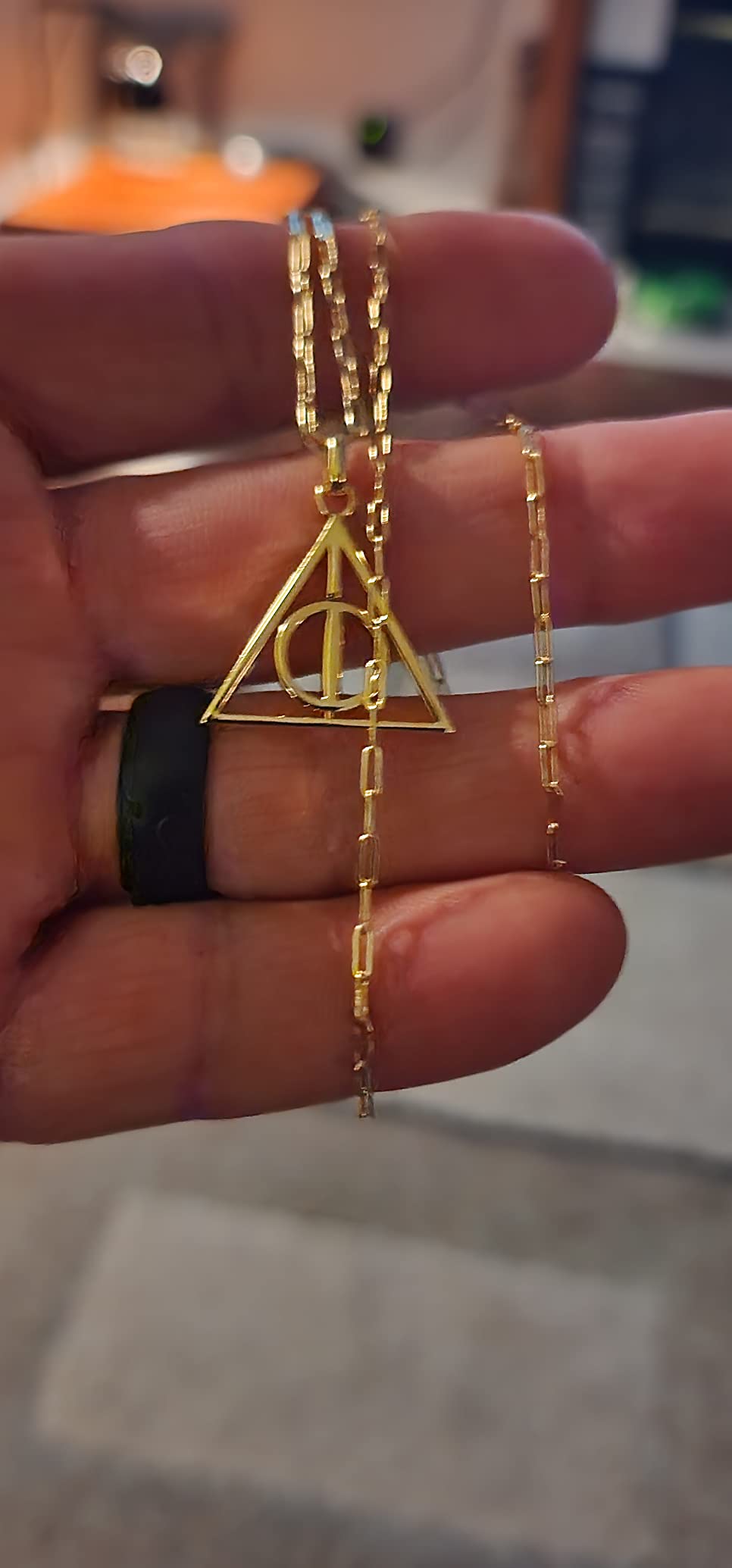Amazon.com: Harry Potter Deathly Hallows Spinning Necklace - 18KT Flash ...